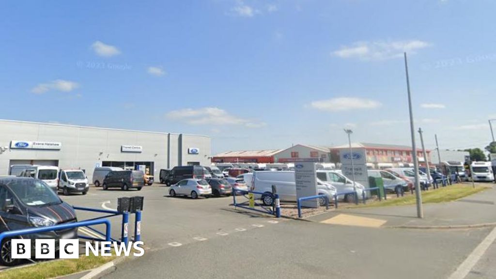 Flintshire garage customer killed after worker reversed over him - BBC News