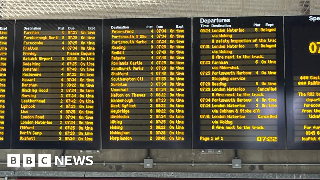 Guildford: Trains cancelled after fire next to track blocks line