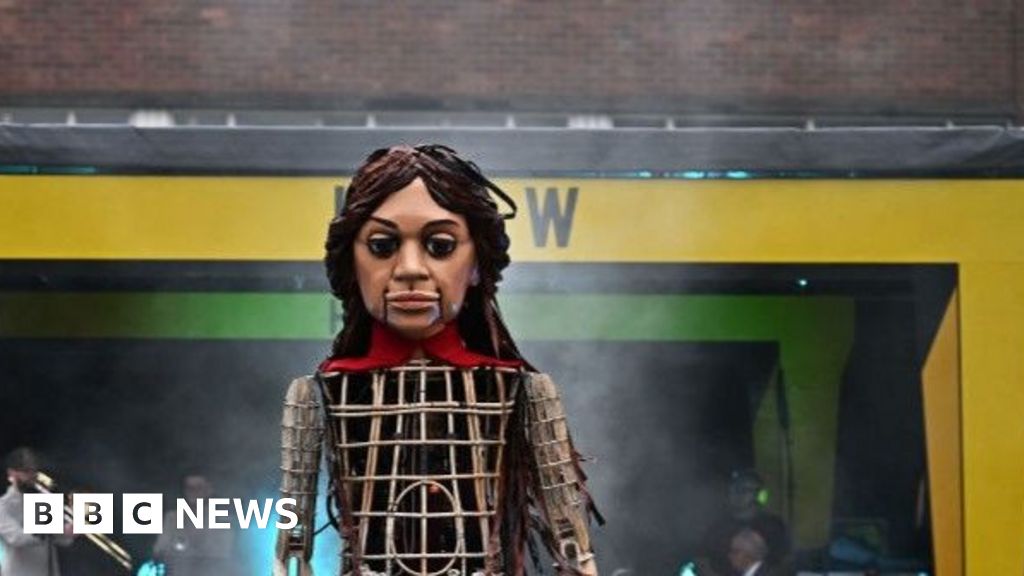 Little Amal: Syrian refugee child puppet arrives in Belfast