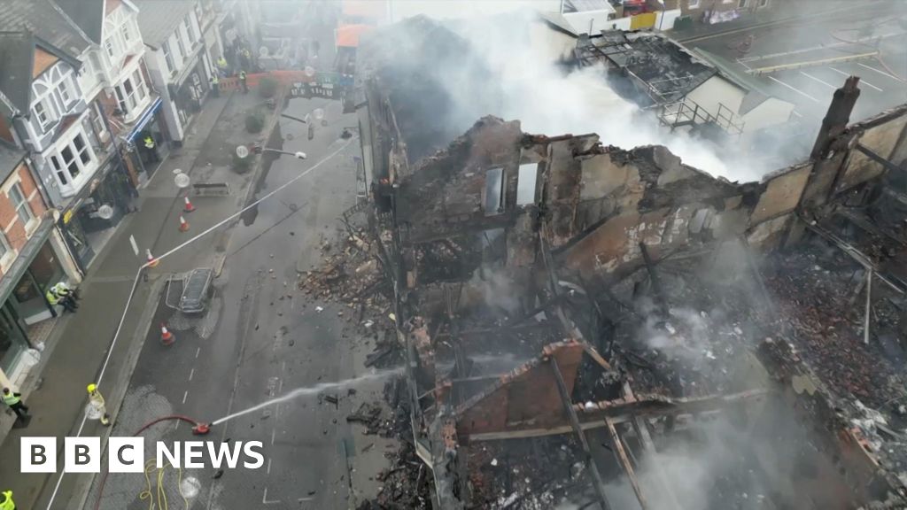 Abergavenny fire: Drone footage shows crews battling blaze - BBC News