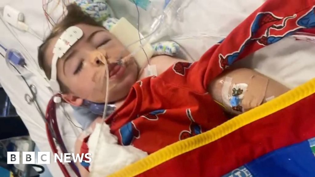 Brecon boy given 'last chance' life support learns to walk - BBC News