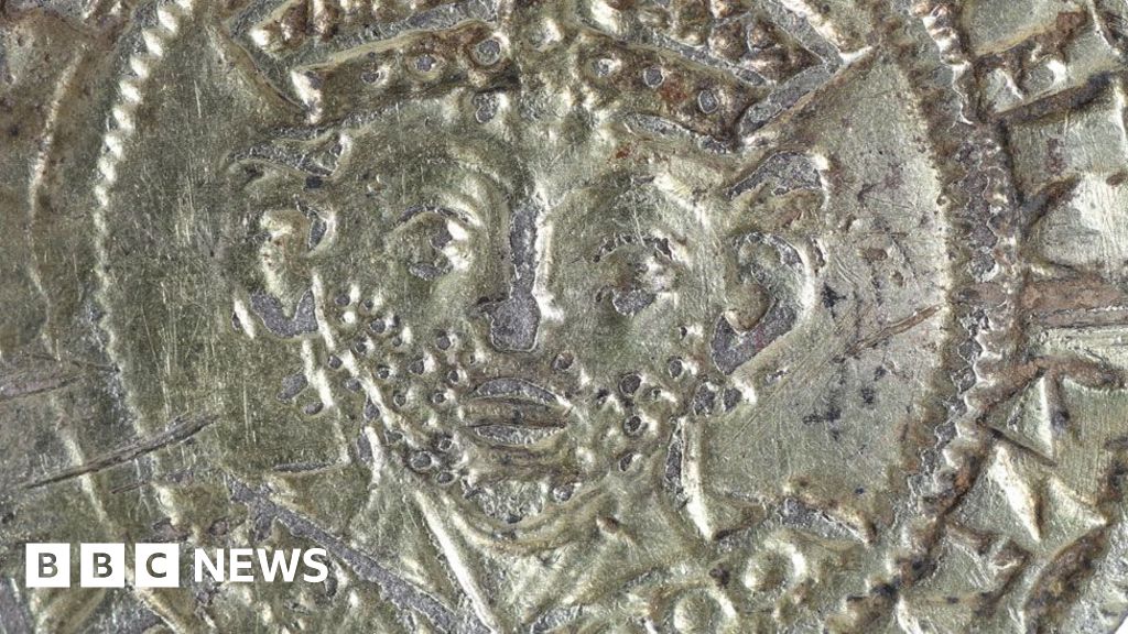Medieval brooch made from French bishop's coin found near Cromer - BBC News