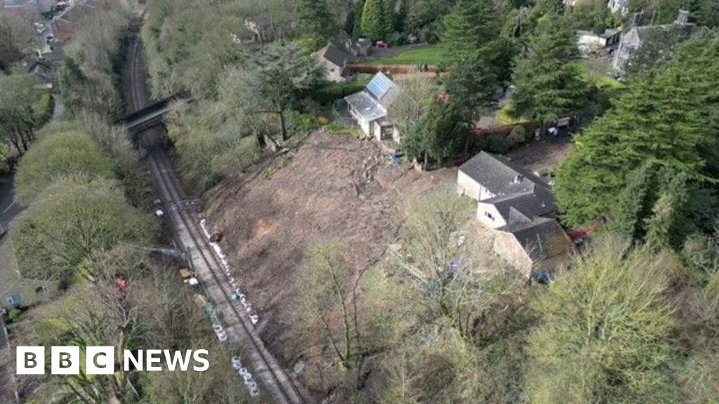 Two homes in Baildon to be demolished due to railway landslip - BBC News