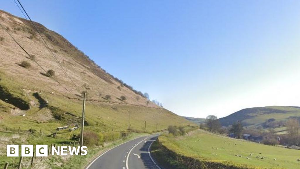 Powys: Motorcyclist dies after hitting road barrier - BBC News