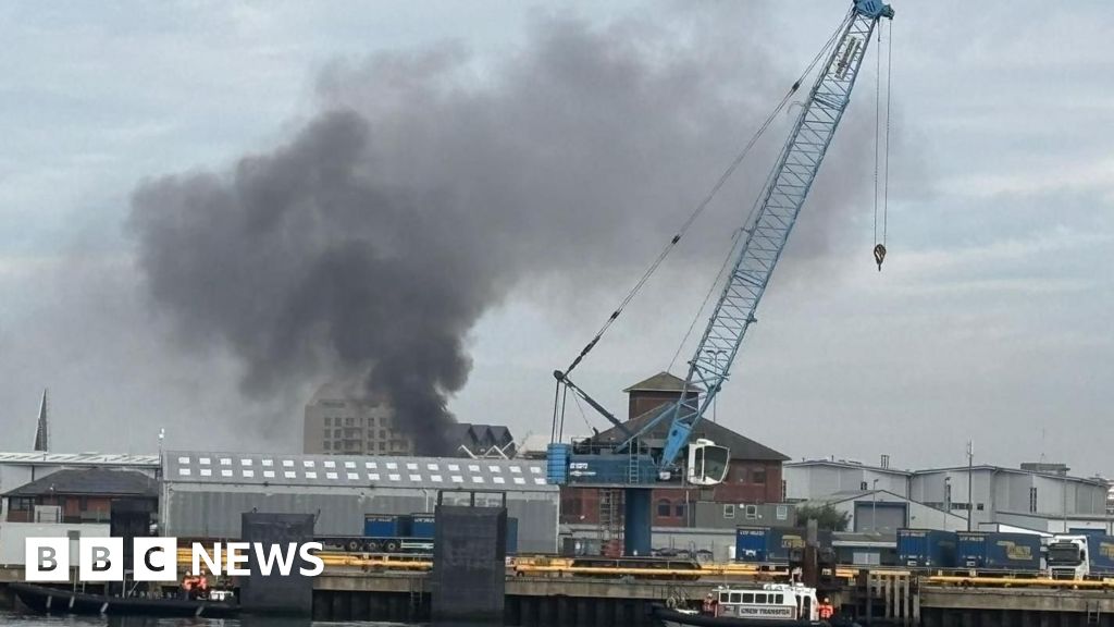 Crews tackle warehouse fire near Poole Quay