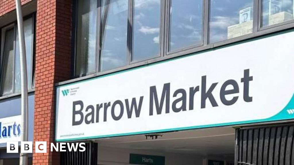 Barrow Market traders open in temporary home during £17m work - BBC News