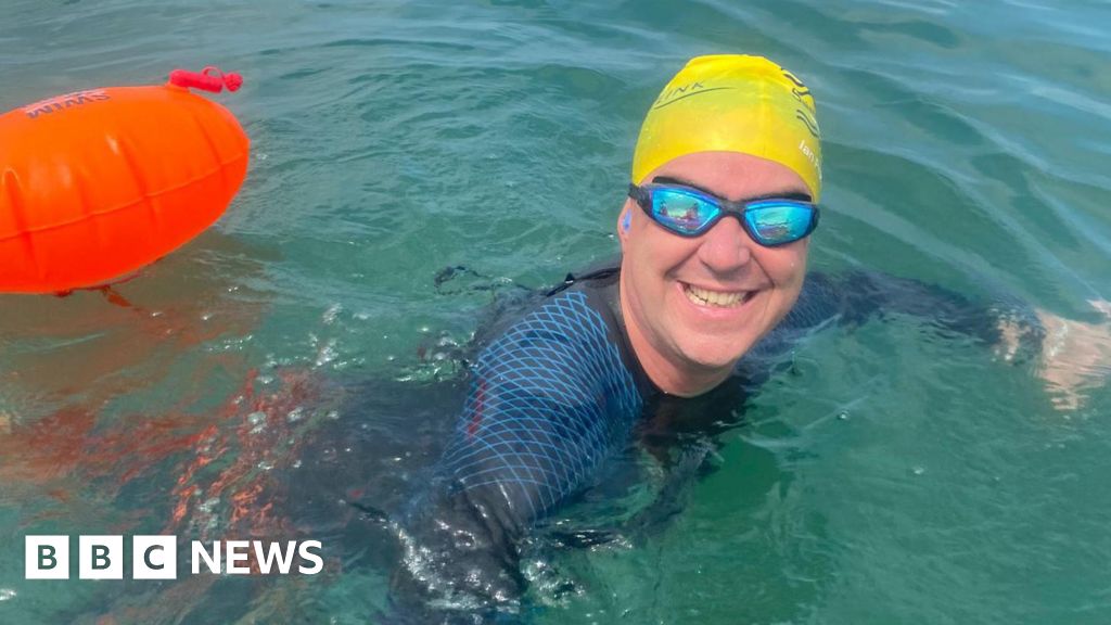 BBC South presenter Edward Sault joins Solent swim for MND - BBC News