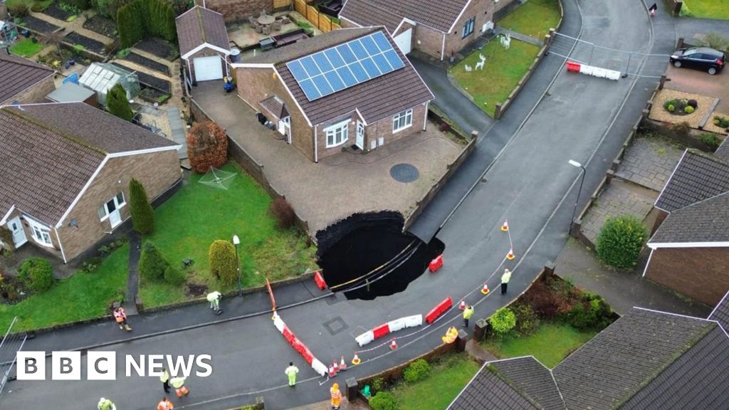 Sinkhole: Merthyr Tydfil home's driveway swallowed - BBC News