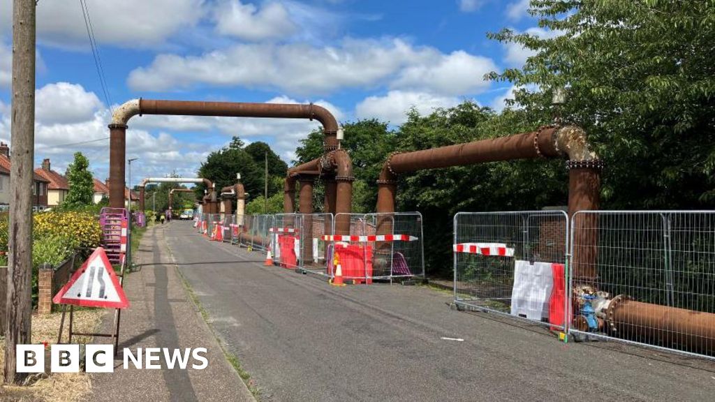 Norwich sewage pipe installed above ground during repair works - BBC News