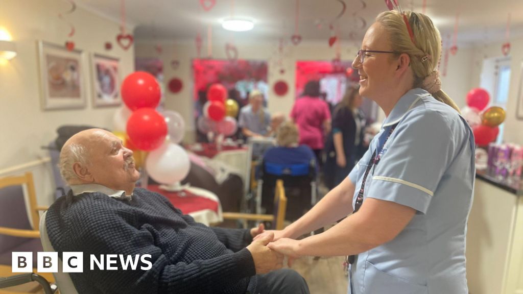 DJ spins the hits at care home Valentine disco - BBC News
