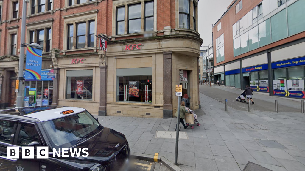 Nottingham: W﻿oman held after man in 70s assaulted outside KFC - BBC News