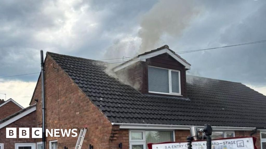 Lightning strike sets fire to roof of Shropshire house - BBC News