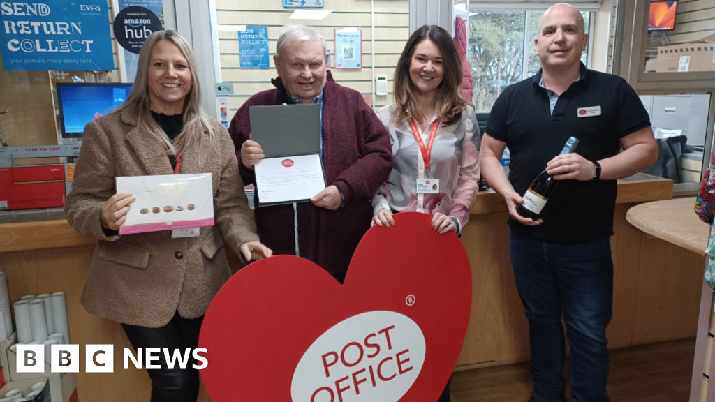 Devon postmaster marks 50 years with long service award