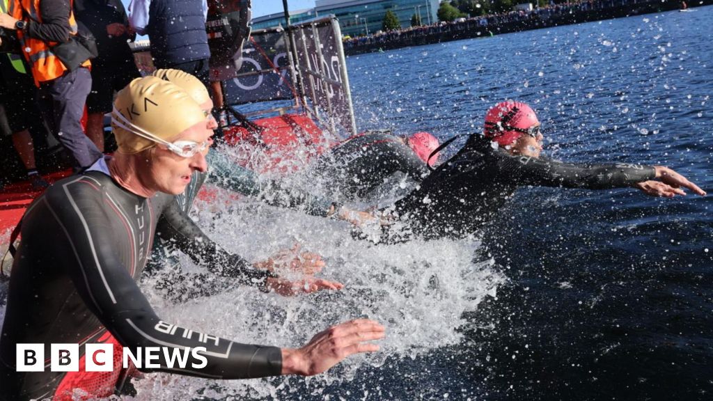 Swansea: Thousands turn out for Ironman 70.3 race - BBC News