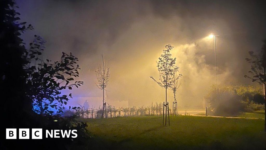 St Ives houses fire: Man arrested on suspicion of arson - BBC News