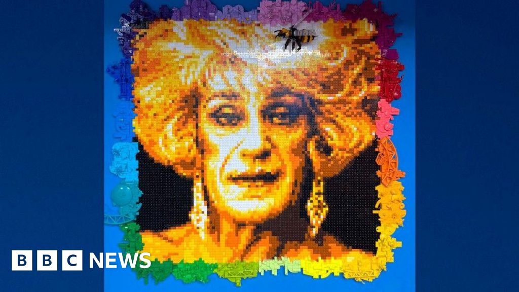 Pride: Manchester drag star dazzles in Lego mosaic - BBC News