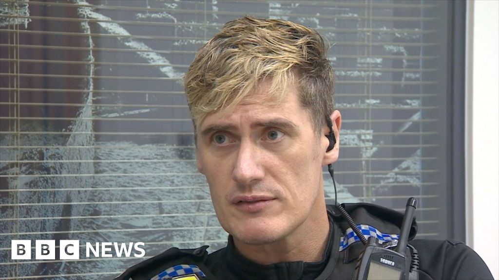 Bodycam footage shows police officers fighting off knifeman