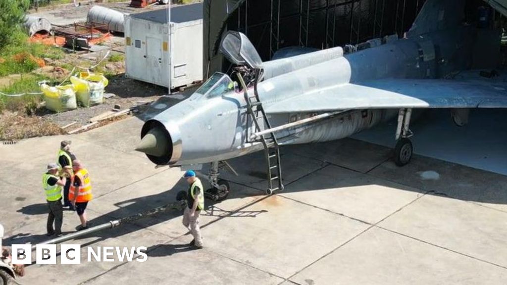 Lightning fighter jet on display after 'exciting' restoration - BBC News