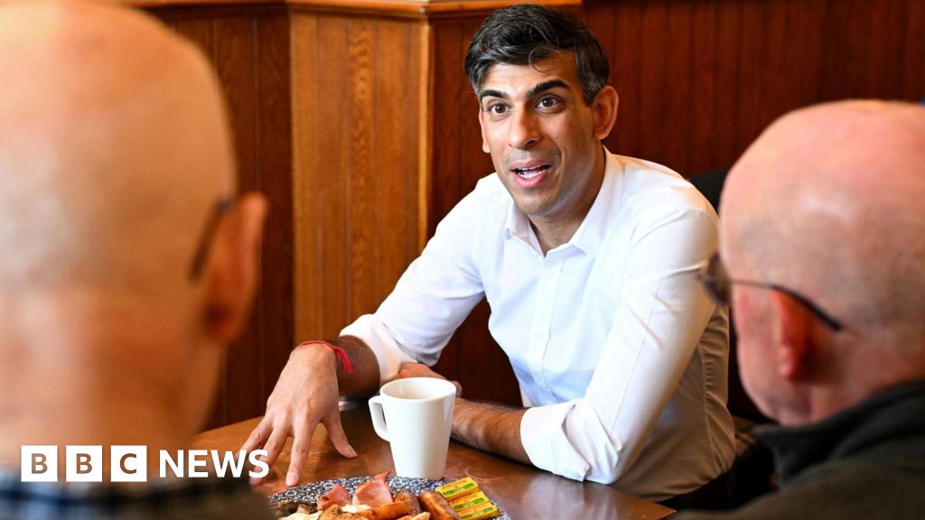 General Election: Sunak jokes about avoiding cold after soggy speech