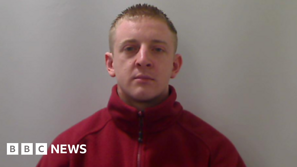 Sean Cruickshank: PSNI search for murderer 'unlawfully at large'