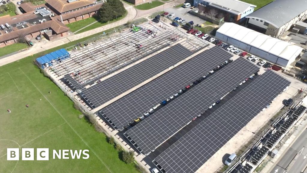 Eastbourne hospital installs 2,250 solar panels on car park roof - BBC News
