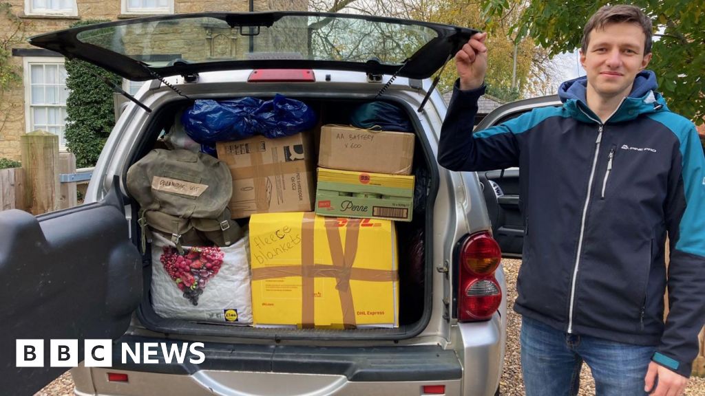 Help offered to get stranded Ukraine aid car back on the road - BBC News