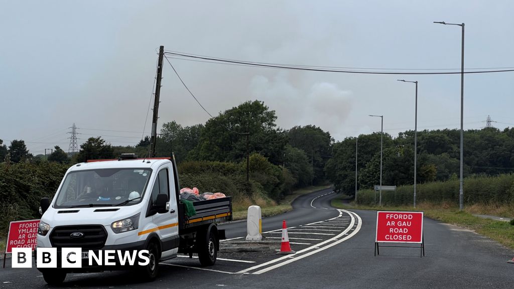 Margam: Fire crews tackle big agricultural blaze - BBC News