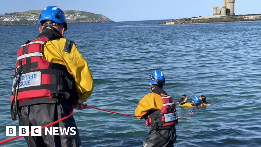 Young swimmers rescued after attempting to swim to Tower of Refuge ...