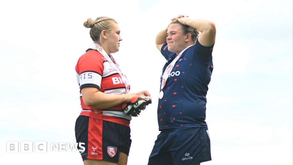 Mackenzie Carson and Sarah Bern facing each other on rugby pitch - BBC News