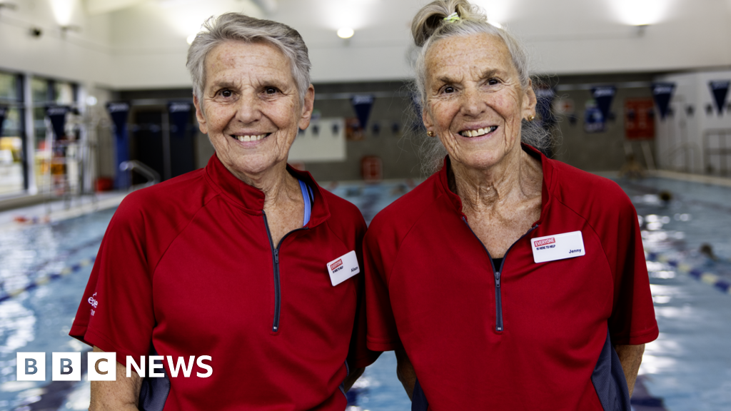 Swimming teacher twins, 80, 'feel at home' at Royston pool - BBC News