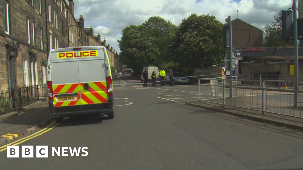 Man, 43, charged after body found in Edinburgh flat - BBC News