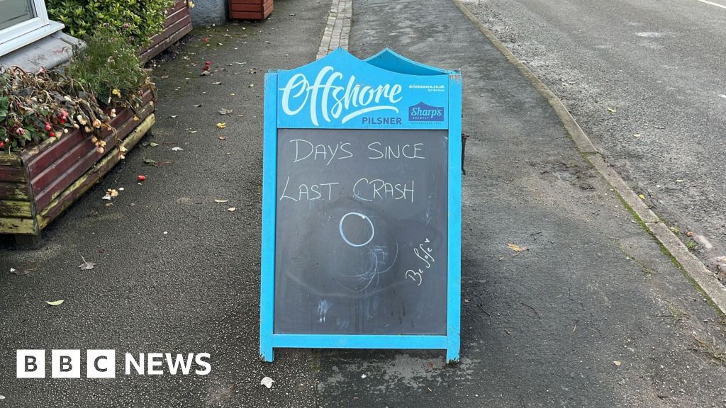Pub uses chalkboard to highlight dangerous junction in Cheadle - BBC News