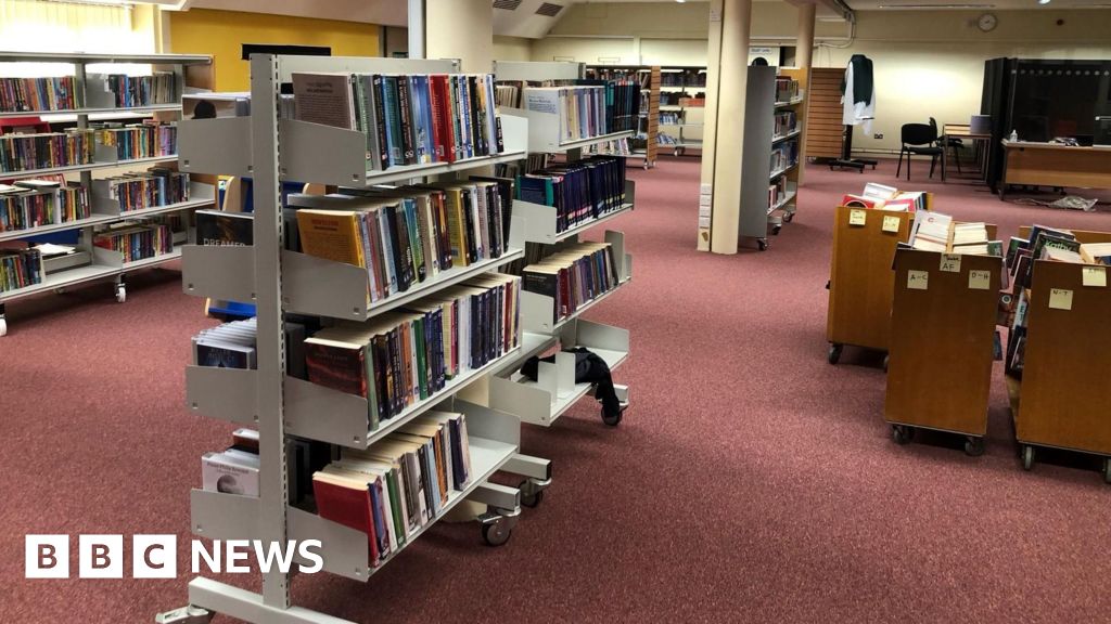 Swindon library reopens months after severe floods - BBC News