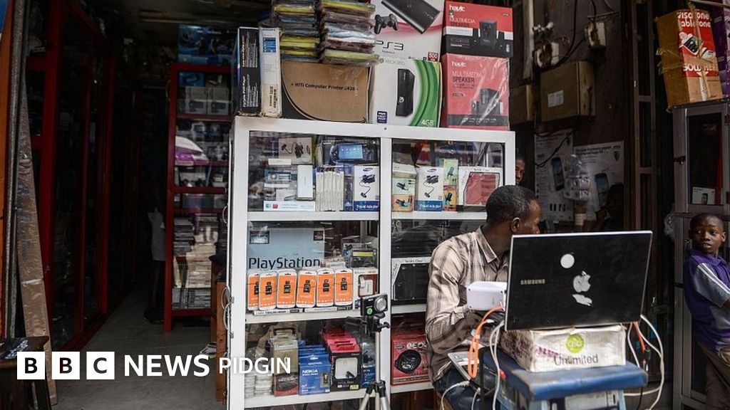 Computer village traders say e no true say Police seal dia shops - BBC ...