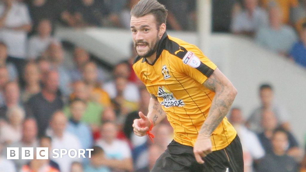 James Dunne: Swindon Town sign midfielder after Cambridge United ...