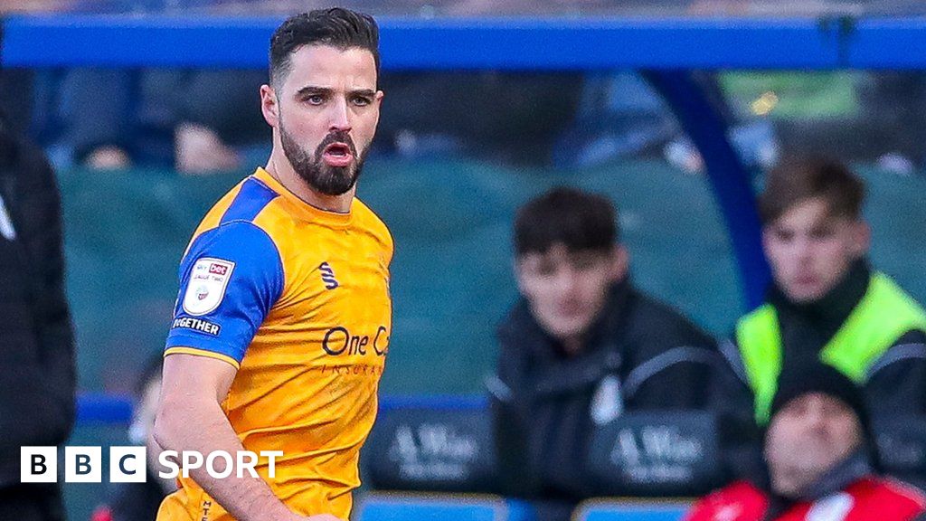 Stephen McLaughlin: Mansfield Town defender out for rest of season with knee injury - BBC Sport