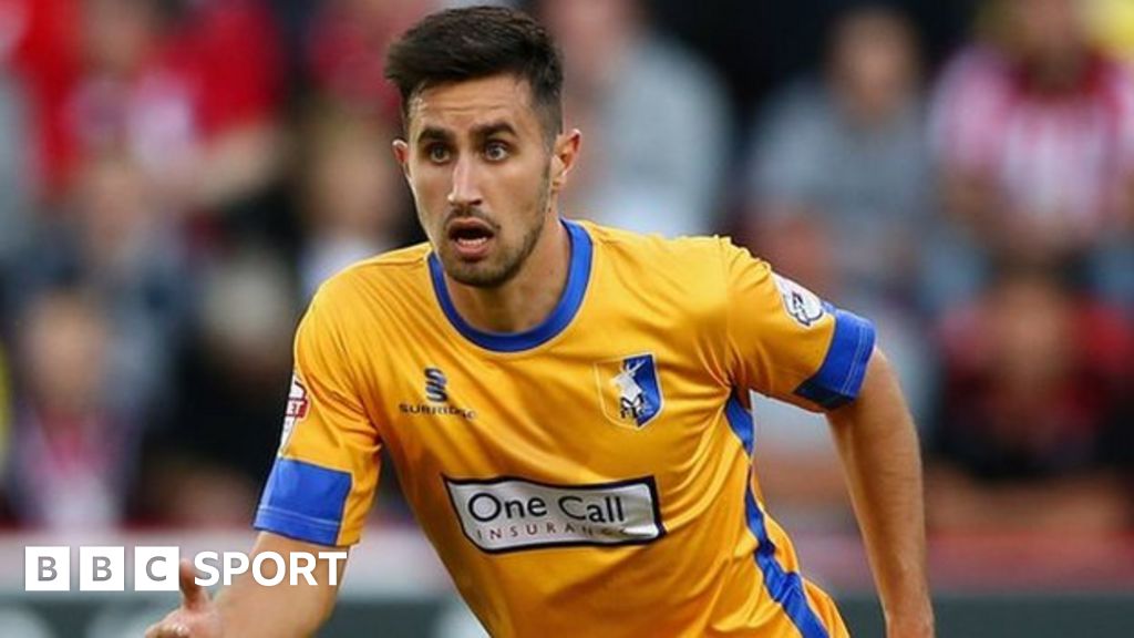 Chris Clements: Midfielder pens new deal at Mansfield - BBC Sport