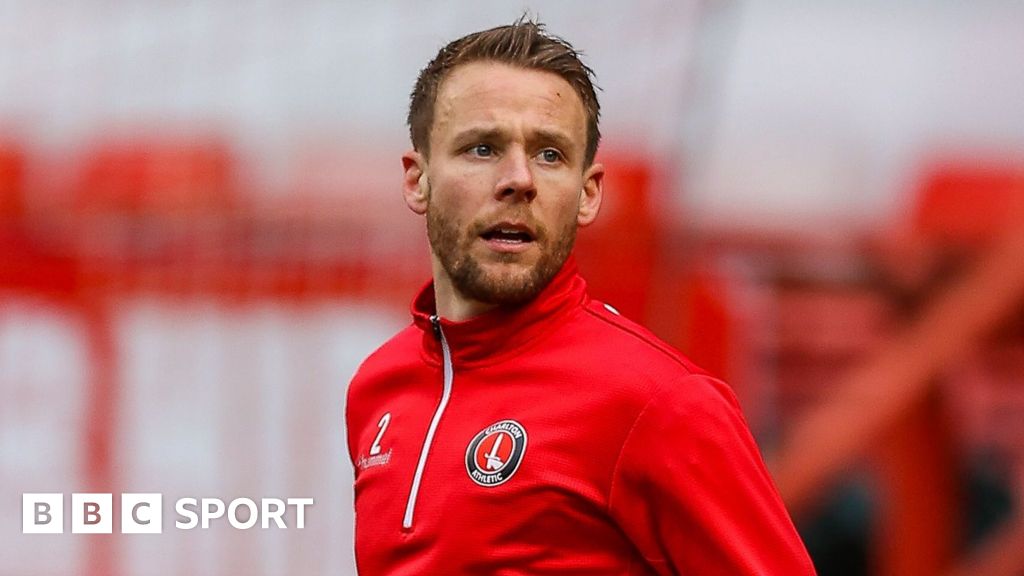 Chris Gunter: Wales defender Gunter signs for AFC Wimbledon - BBC Sport