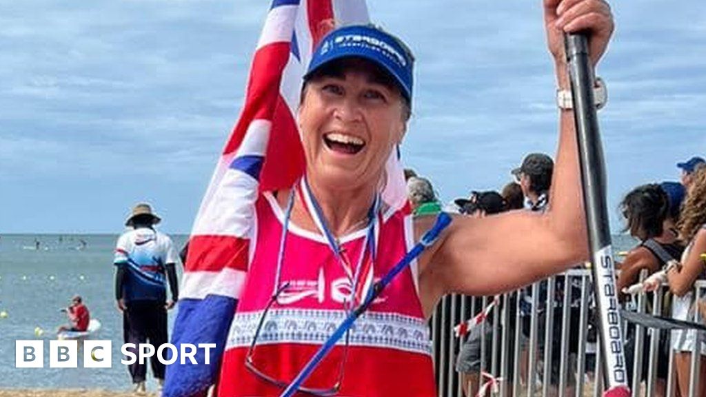 Marie Buchanan: Devon paddleboarder retains world title - BBC Sport