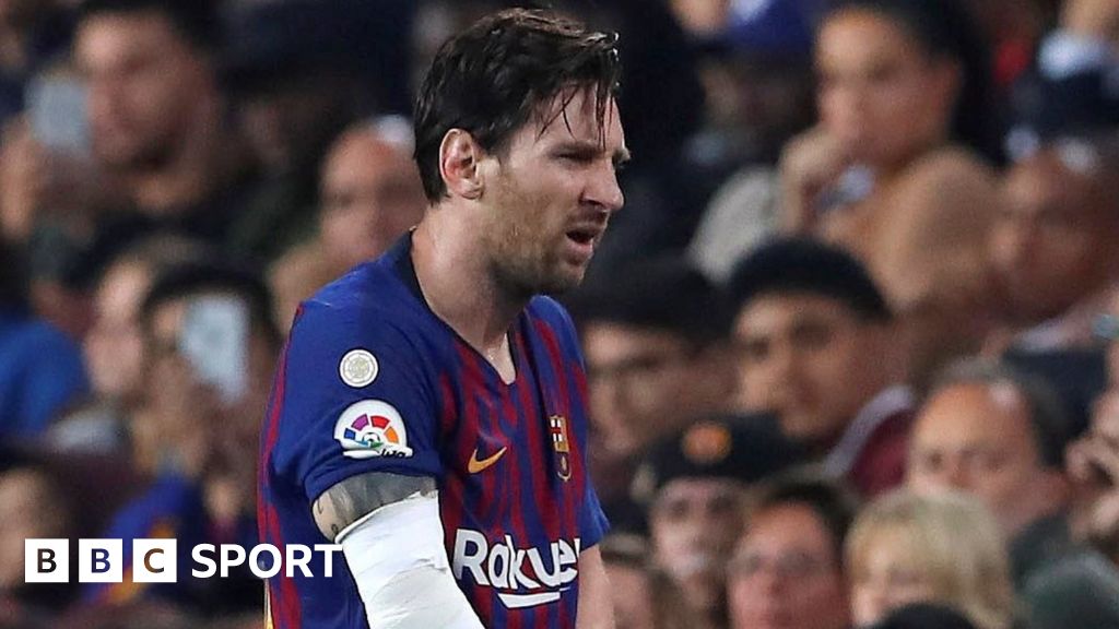 Lionel Messi suffers arm injury in Barcelona's win over Sevilla - BBC Sport