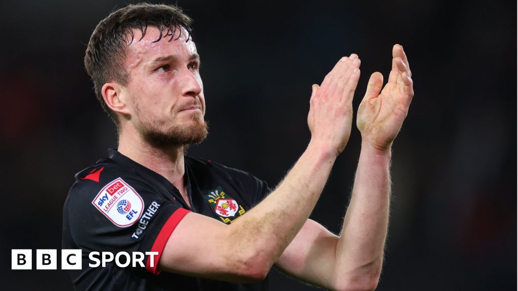 Luke Young: Skipper focused on Wrexham success after milestone - BBC Sport