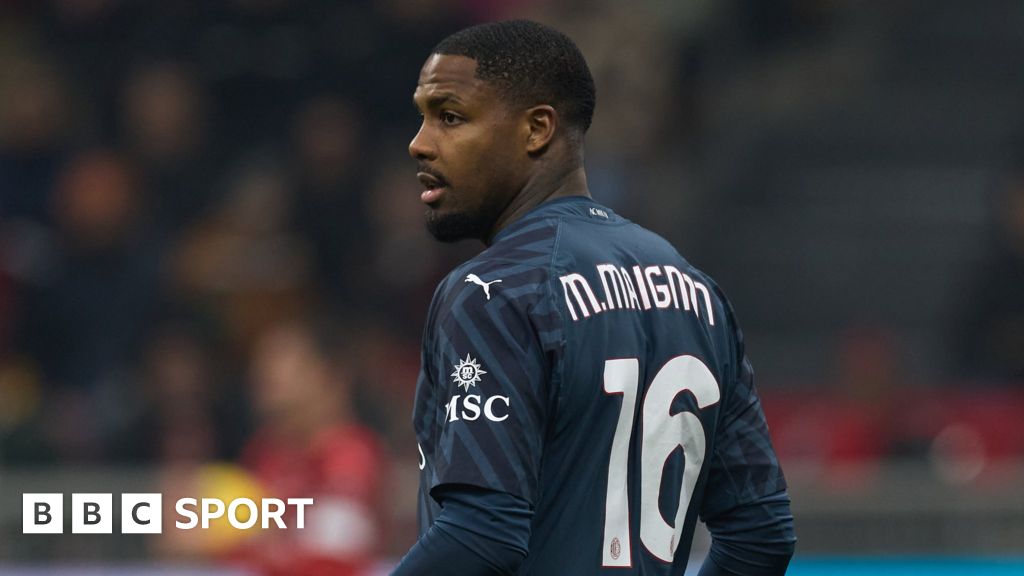Mike Maignan: AC Milan halt match in show of support for goalkeeper after racist abuse - BBC Sport