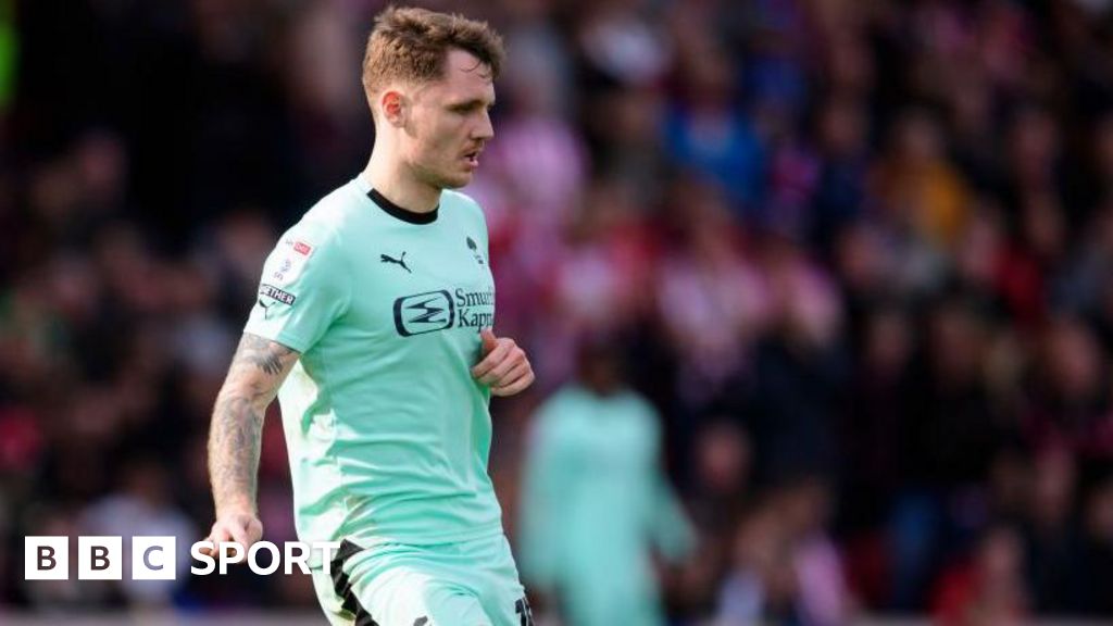 Wigan Athletic defender Jason Kerr signs two-year contract - BBC Sport