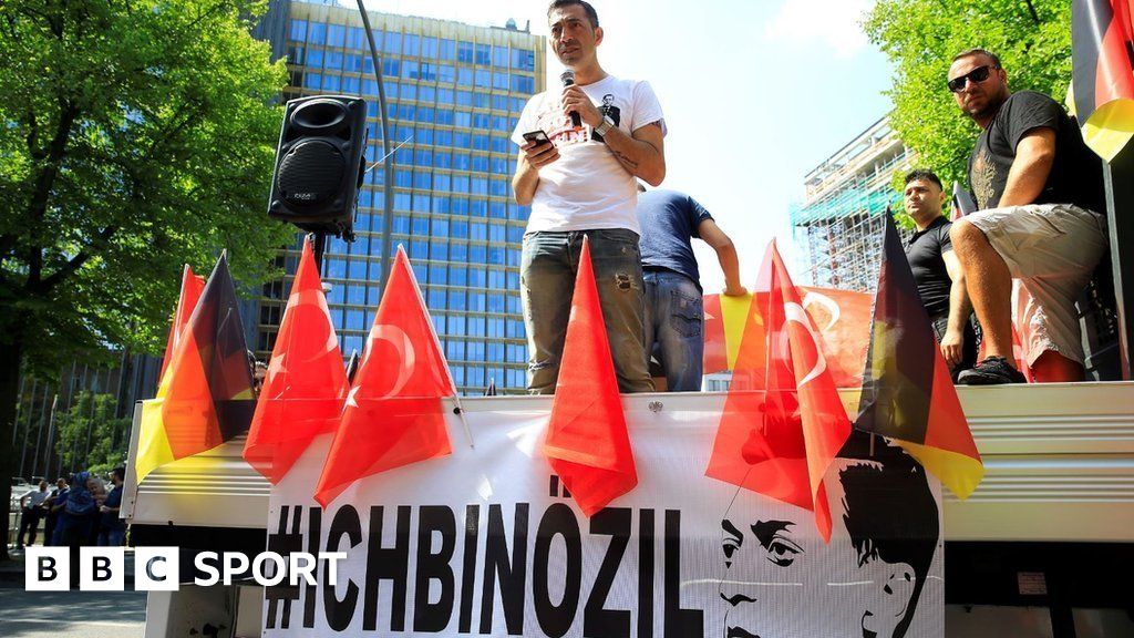 Mesut Ozil: German fans protest in support of Arsenal midfielder - BBC ...