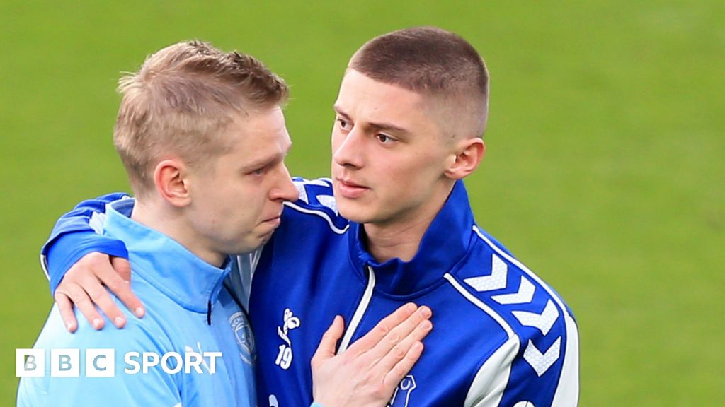 Ukraine crisis: Vitaliy Mykolenko and Oleksandr Zinchenko embrace as ...