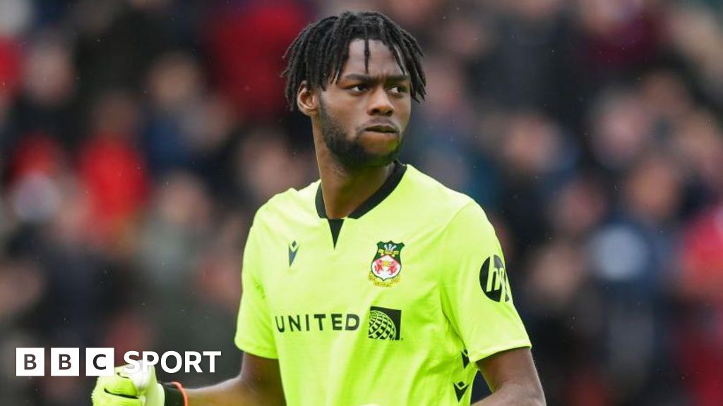 Defender Aaron James signs new Wrexham contract - BBC Sport