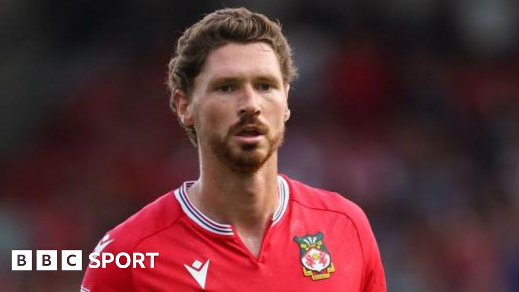 George Evans: Midfielder signs new Wrexham deal - BBC Sport