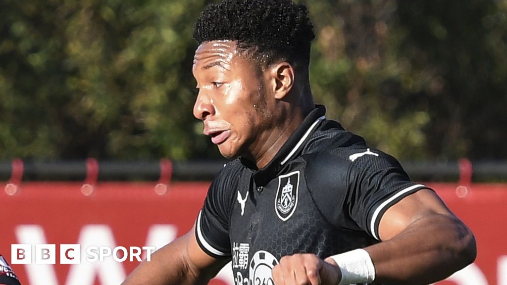Ali Koiki: Burnley left-back joins Swindon Town on loan - BBC Sport