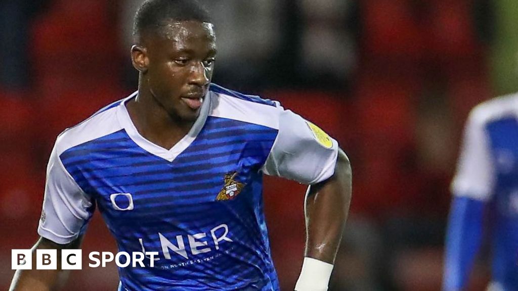 Joseph Olowu: Doncaster Rovers defender extends deal - BBC Sport