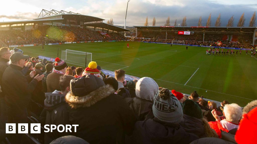 Wrexham to expand temporary stand after 'reassessing' stadium plans ...